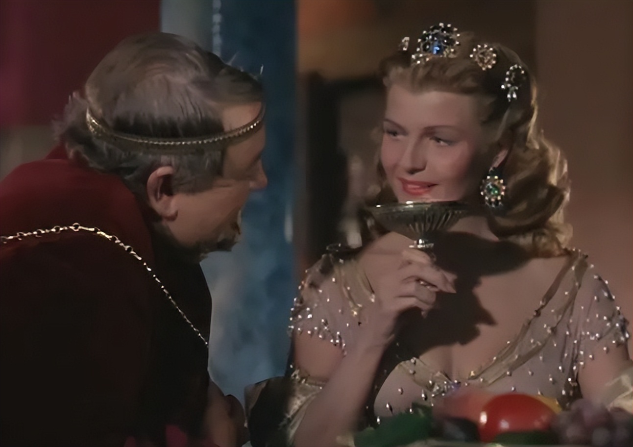 How does Hayworth's performance of "Salome" convey the emotional charm ...