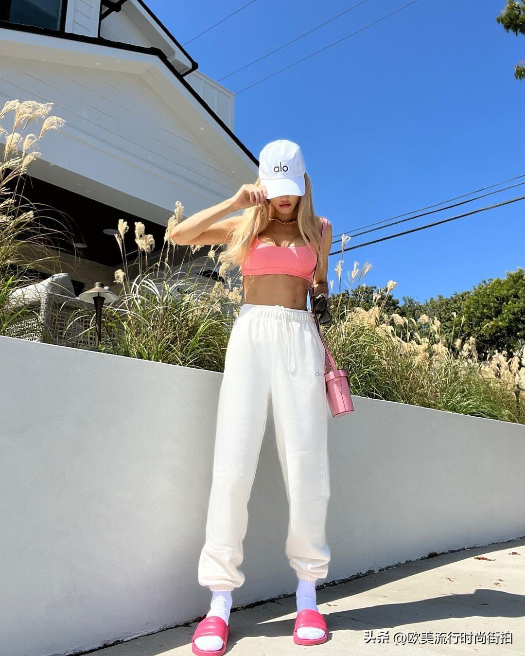 American supermodel Joy Corrigan poses in Alo outfit - iMedia