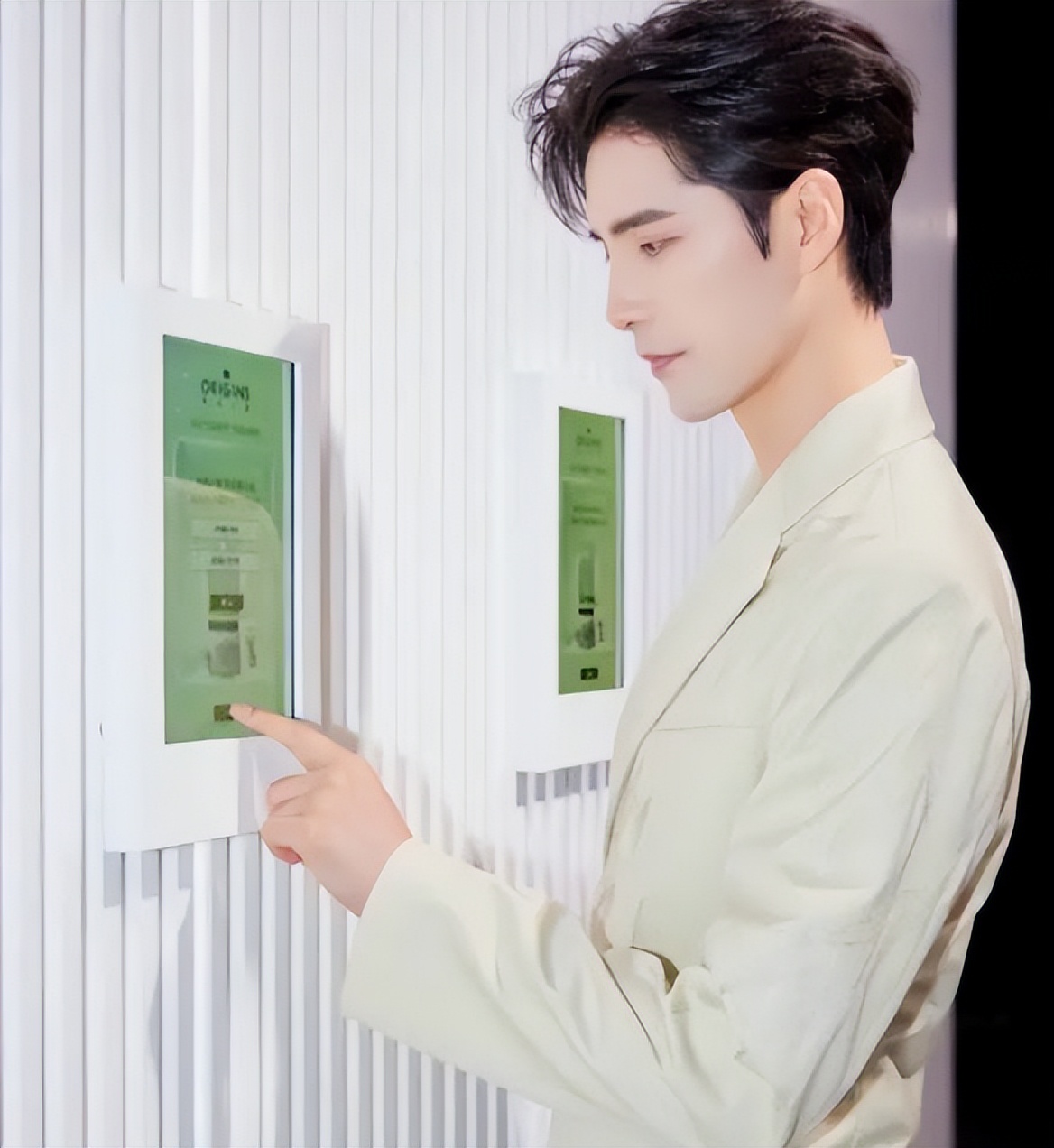 Ayunga interprets ancient paintings. Although he looks old-fashioned ...