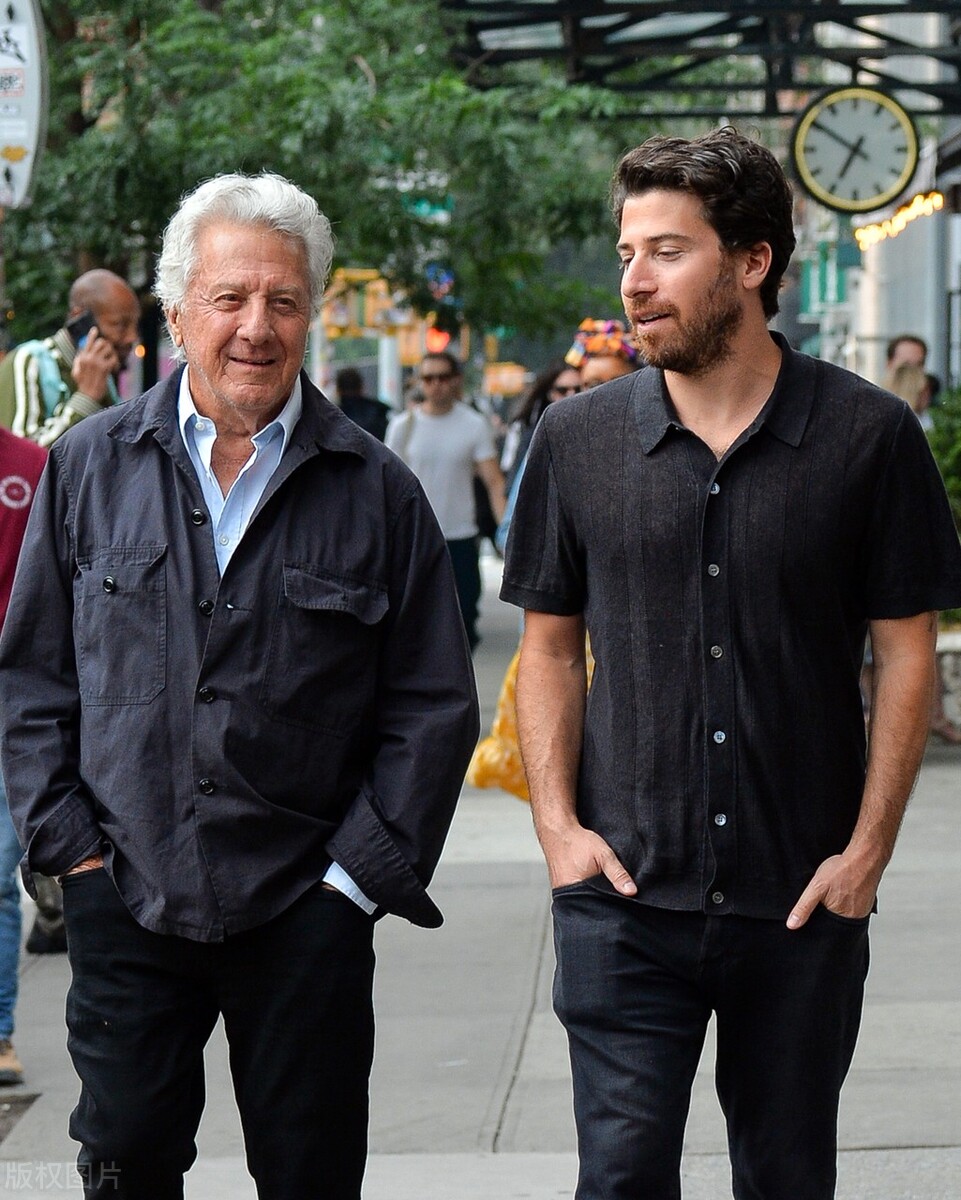 Dustin Hoffman and his son are walking on the street. The father and ...