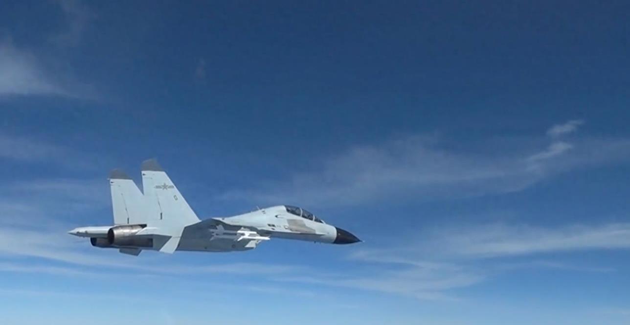 Chinese navy 11BSH fighter jets intercepted a US military RC-135 ...