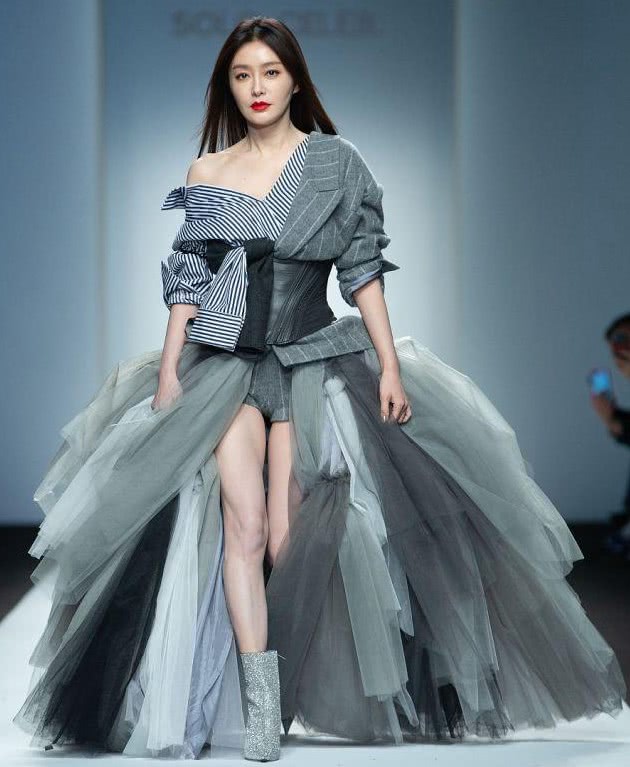 It not only uglifies her facial features but also her body. Is this a ...