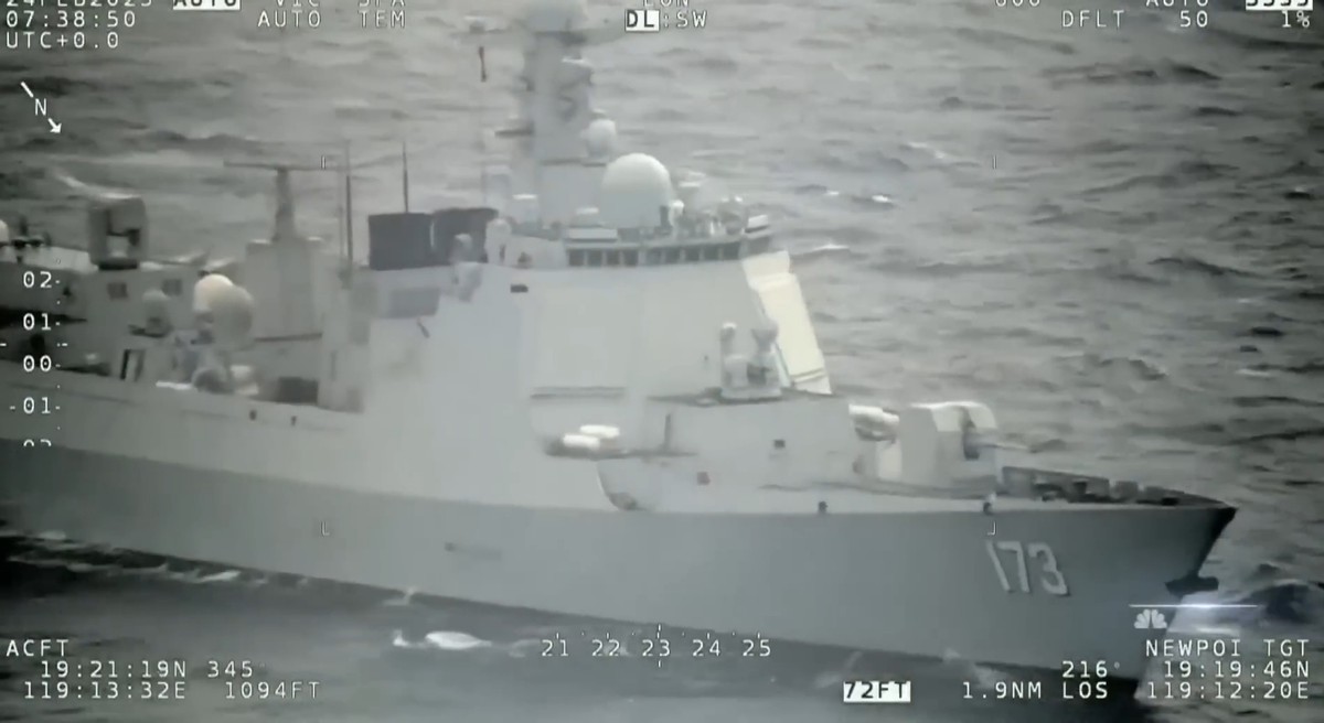 The U.S. military plane took reporters into the South China Sea and was targeted by 052D naval ...