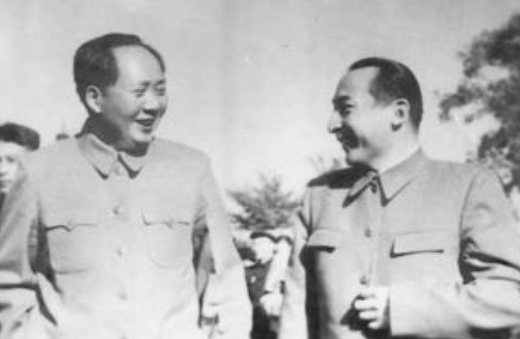 At the founding ceremony in 1949, a young man wearing a black hat stood ...