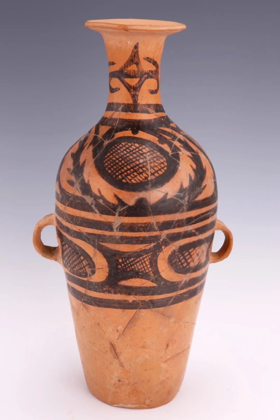 Painted pottery vase with spiral pattern and pointed bottom: the ...