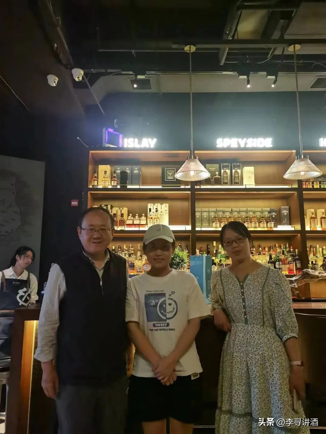 A female bar manager with the ability to plan for the future ...