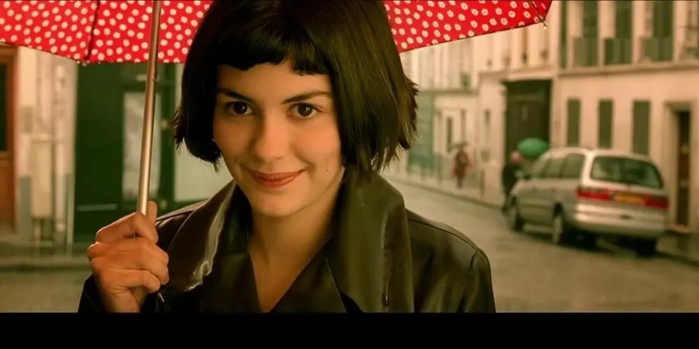How does Amélie differ in its analysis of love, destiny, and ...