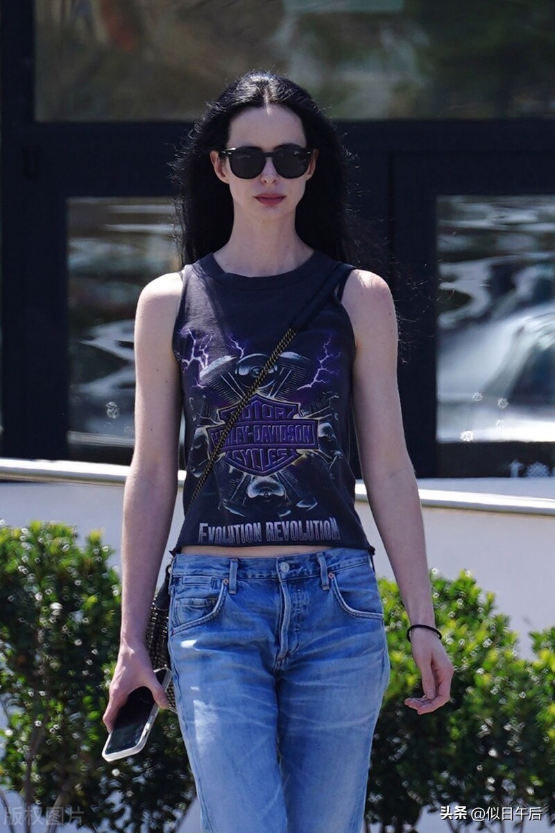 Christen Ritter is casually handsome wearing a black printed vest ...