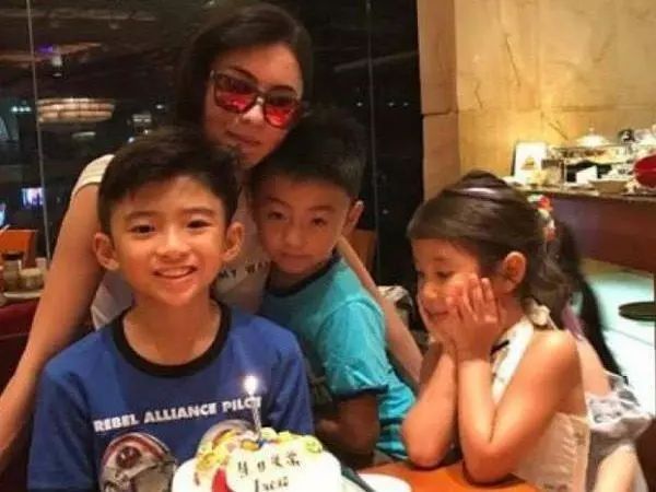 Cecilia Cheung and Yili Wu, both single mothers, regard their children ...