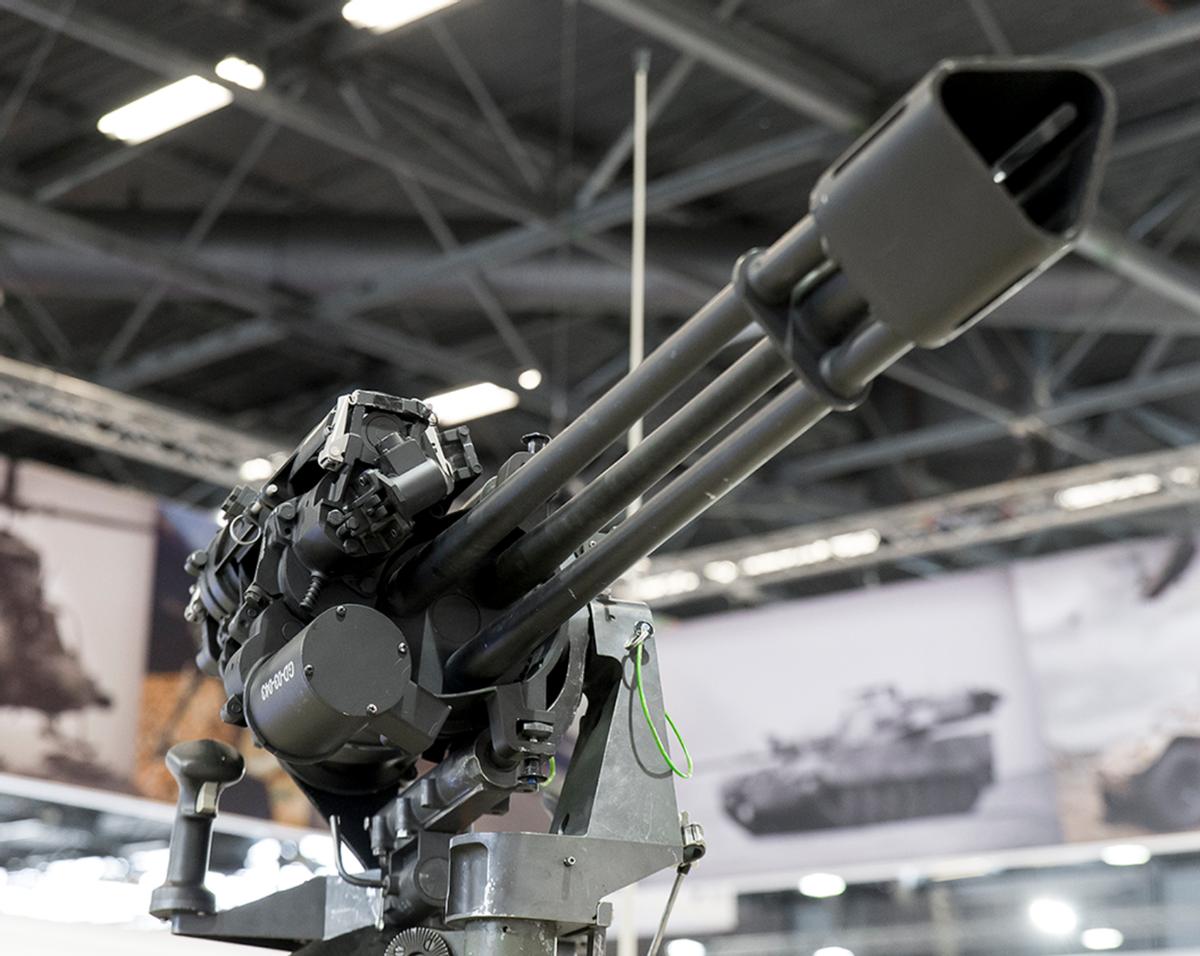 Although this Gatling gun of the US Army has only 3 barrels, it is ...