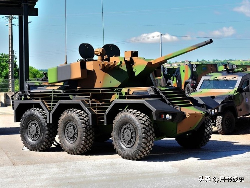 Another French armored vehicle with a small car carrying a cannon ...
