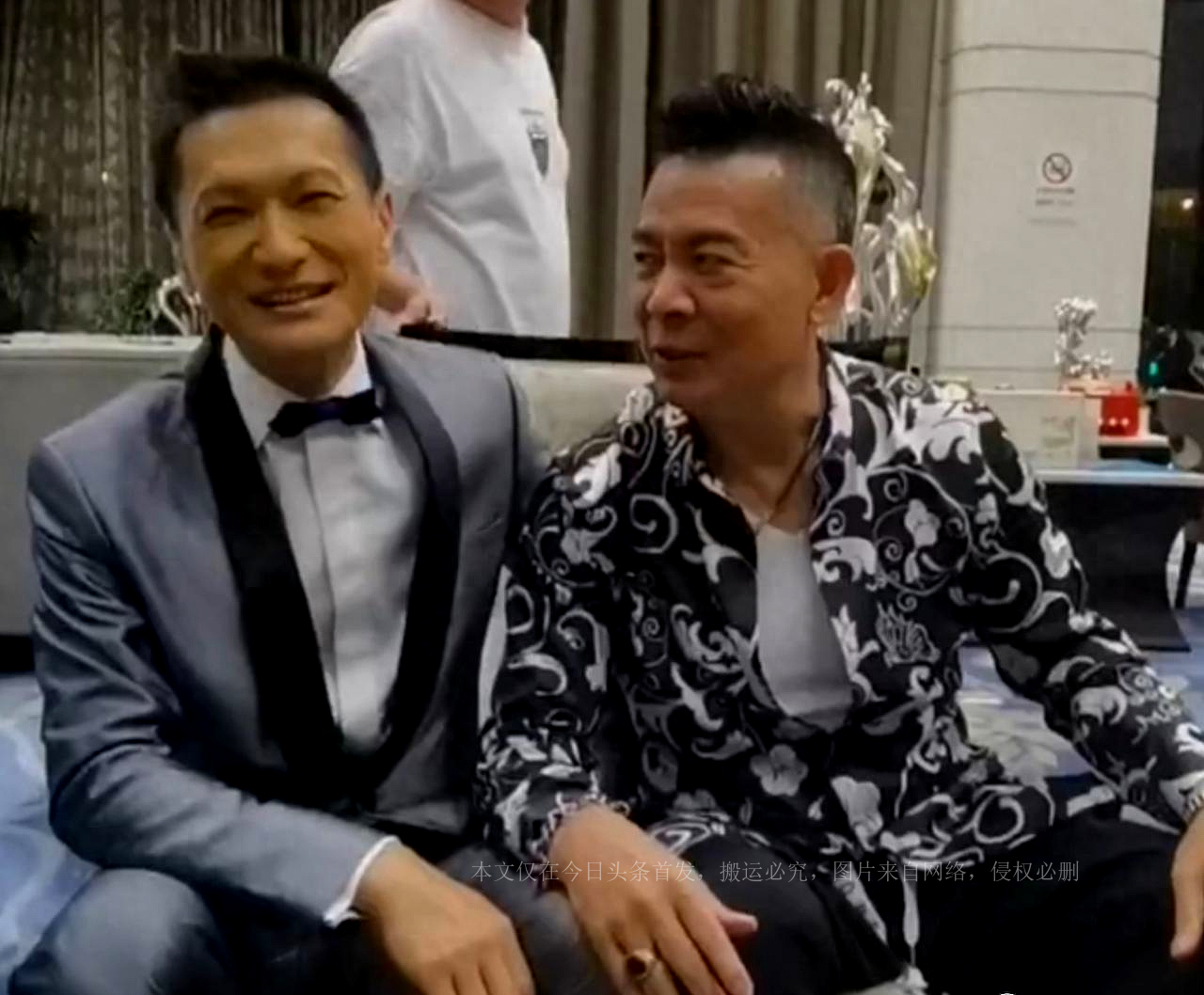 56-year-old Chen Jinhong has a sallow complexion and thinning hair. Behind him is a mountain of ...