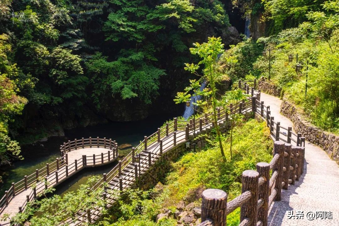 Avoid the festival crowds, check in the Longtan Waterfall surrounded by ...