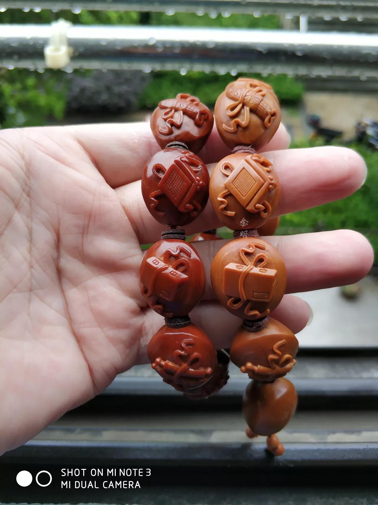 Olive stone carving encapsulated and jadeized (the meaning of olive ...