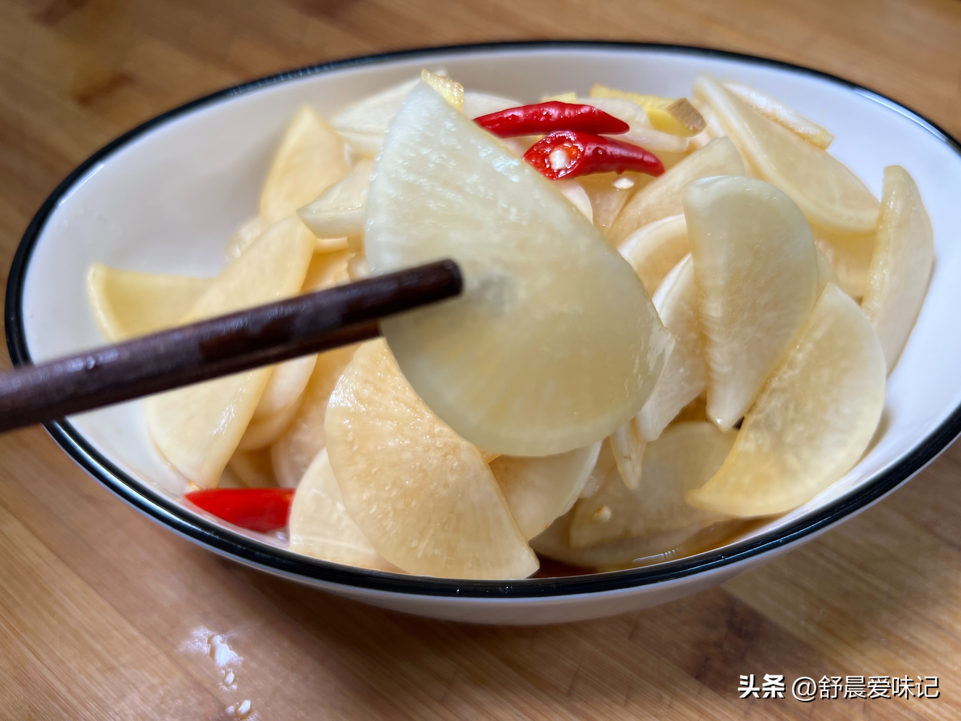 A white radish does not need to be peeled and cut into thin slices ...