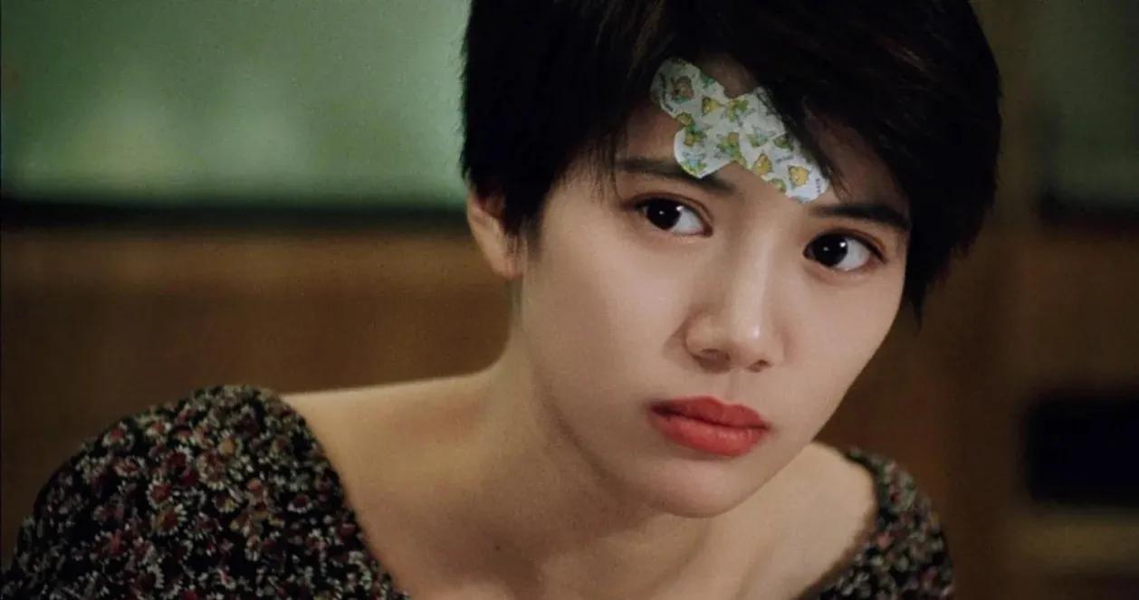 Anita Yuen: A beautiful woman with short hair and elegant long hair ...