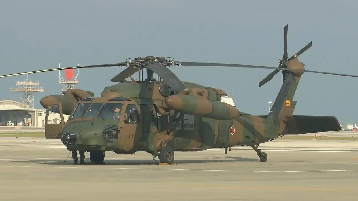 Laughing: Japan's Black Hawk helicopter plunges into the East China Sea ...