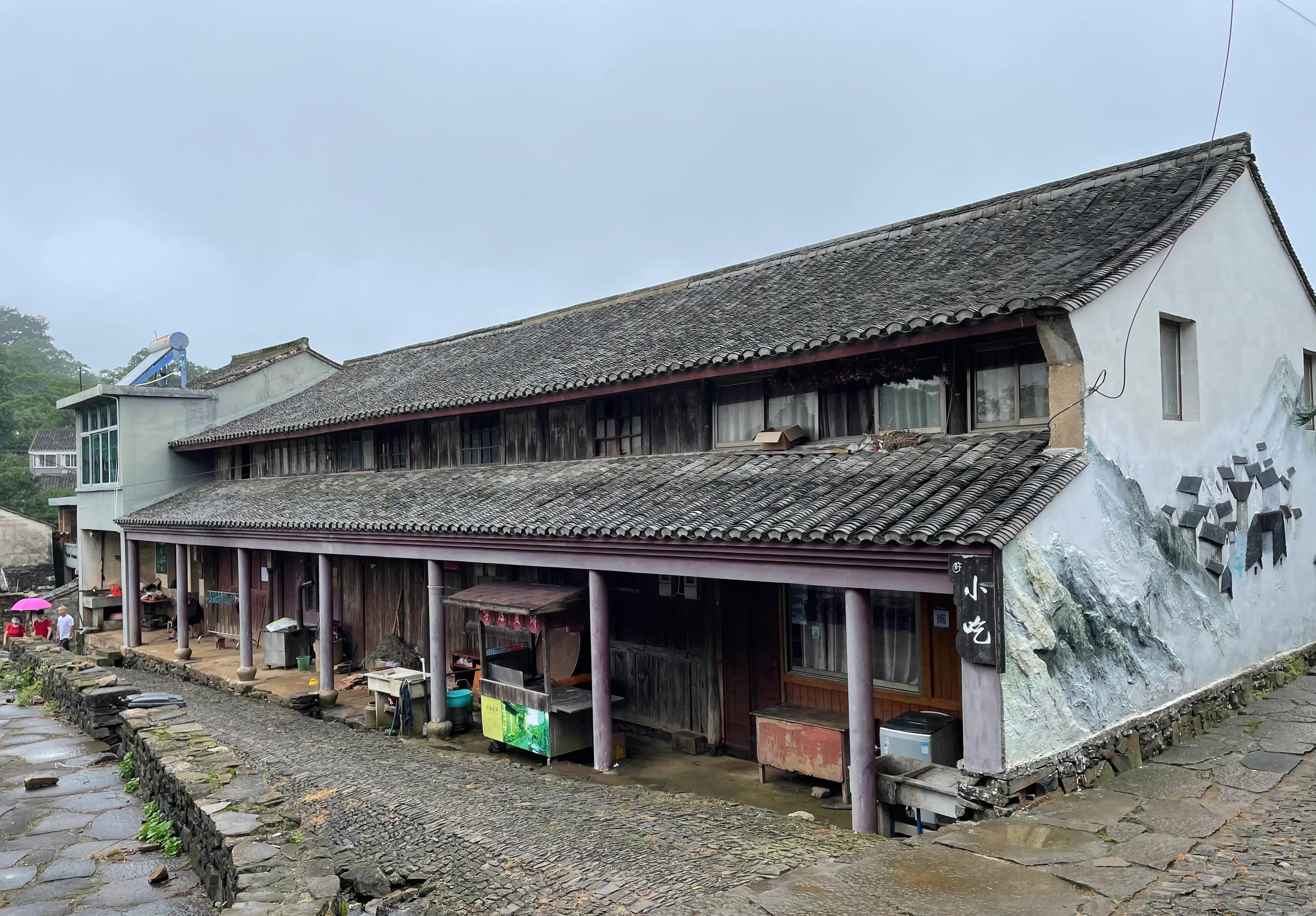 Xujiashan Shitou Village, a group of buildings made of stacked copper ...