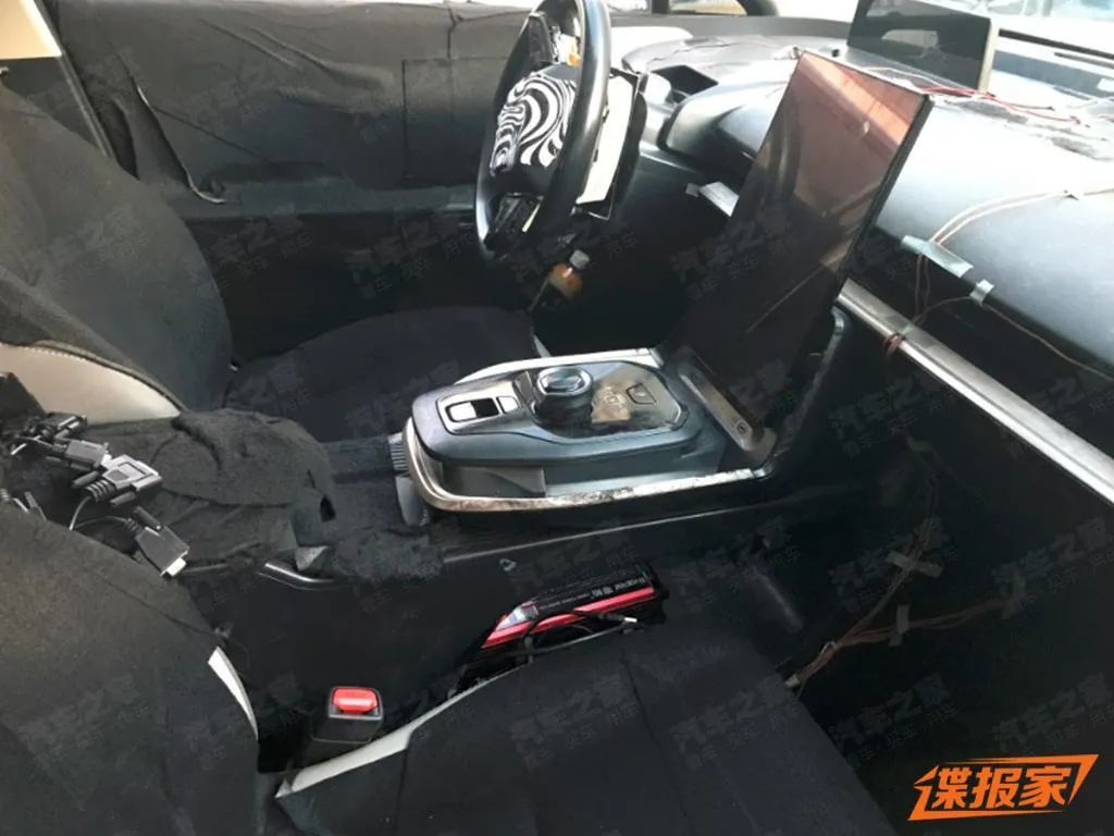 Toyota bZ3 interior spy photos exposed; Jidu ROBO-01 spy photos exposed ...