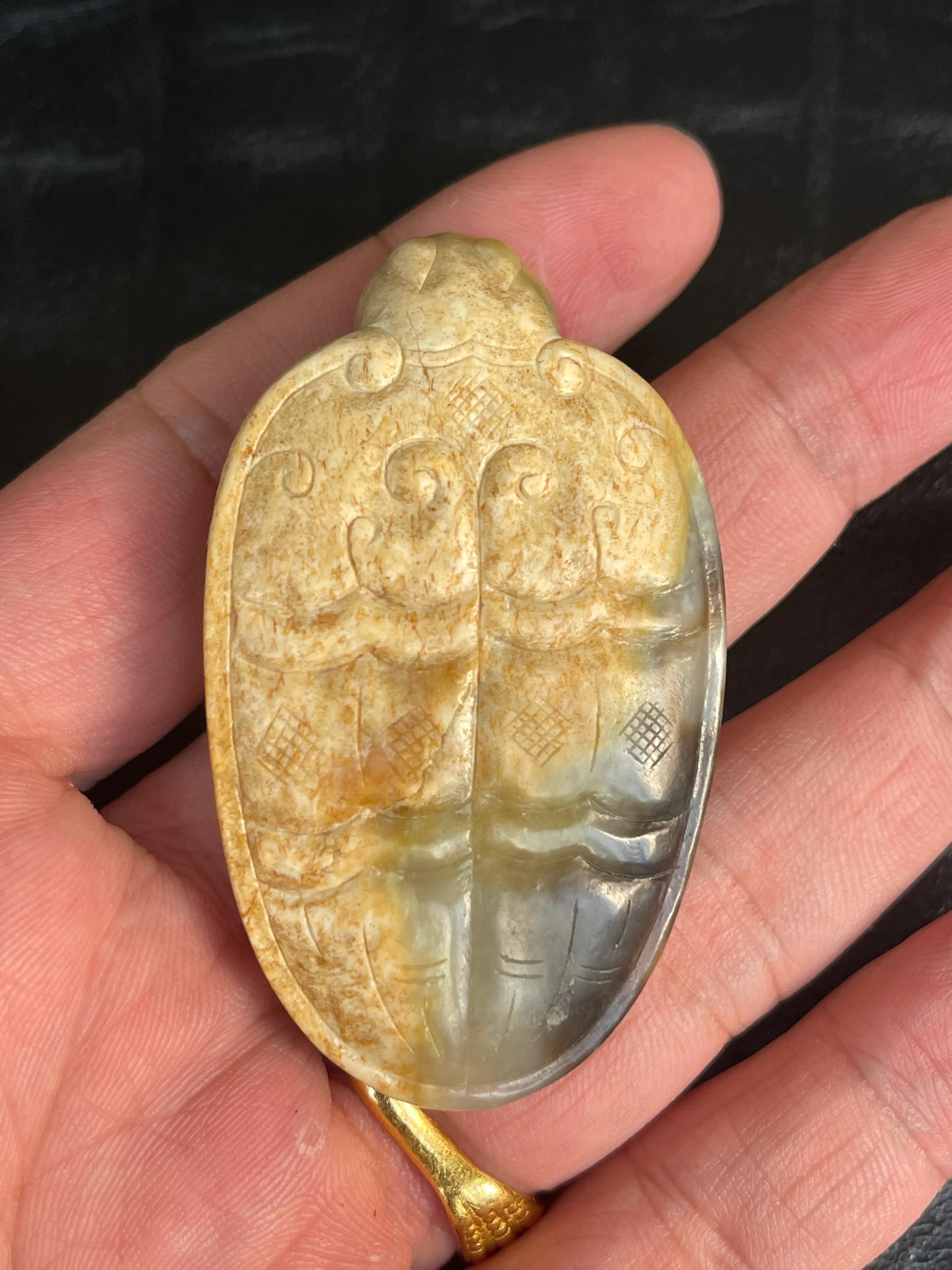 Interpretation of the Spring and Autumn Face Jade Pendant: Cultural ...