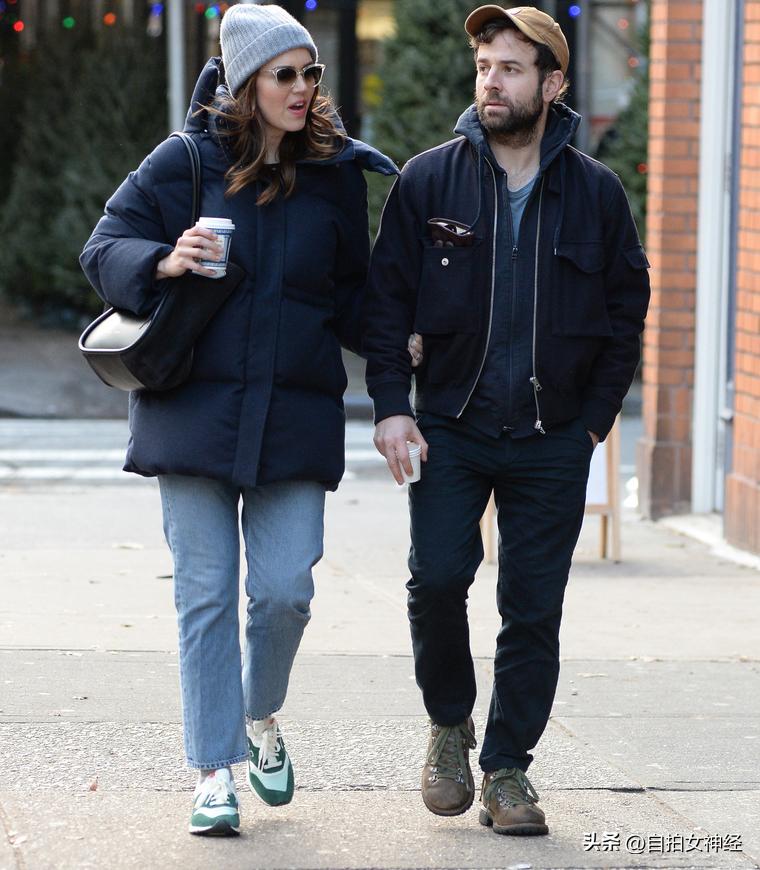 Actress Mandy Moore takes a leisurely walk on the street and arms with ...