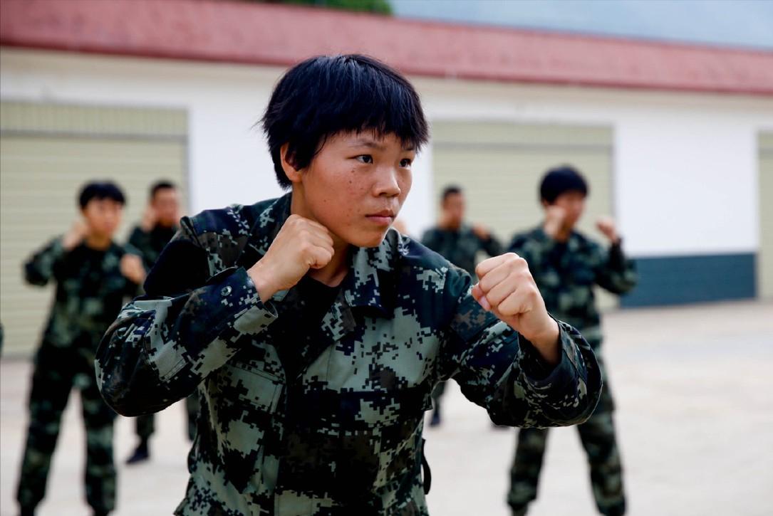 "Parents' Love" shows the image of female soldiers in military-themed ...