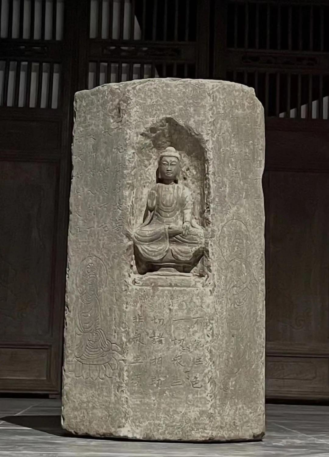 Bluestone Buddhist scripture column - iNEWS