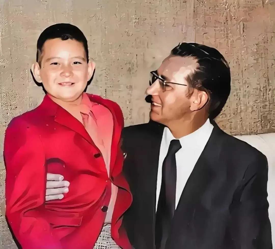 A photo of Fei Xiang and his father in the 70s, looking very cute in a ...