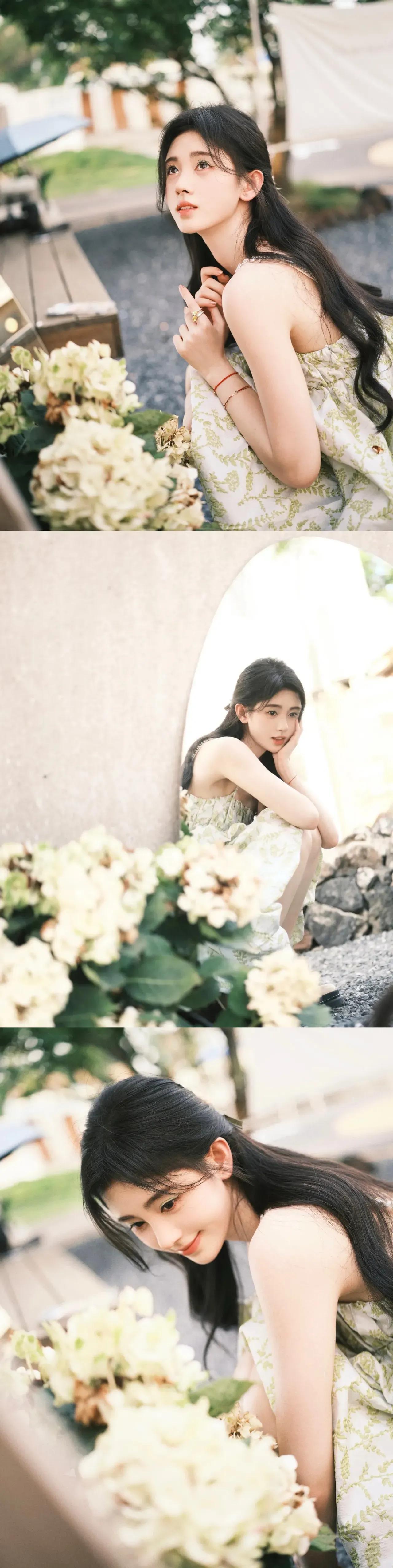 Ju Jingyi has long curly hair and a green floral suspender skirt. The ...