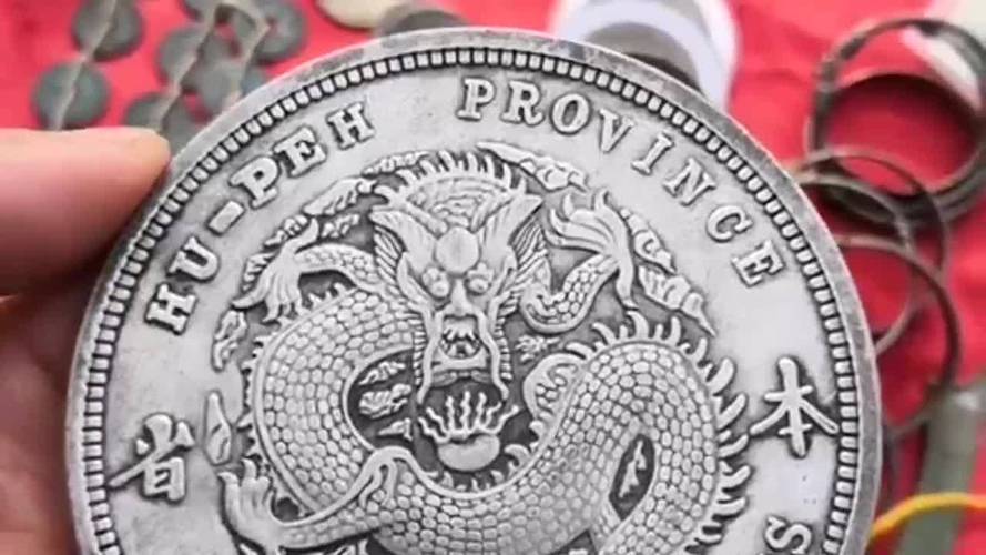 The descendants of the old silversmith use silver coins to appraise ...