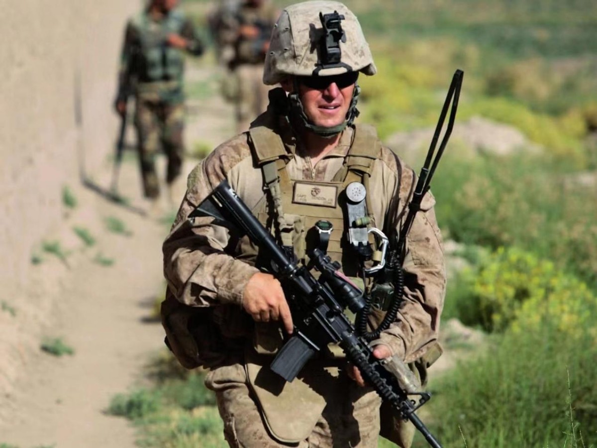 How heavy is the equipment on the American soldiers? Each one weighs an ...