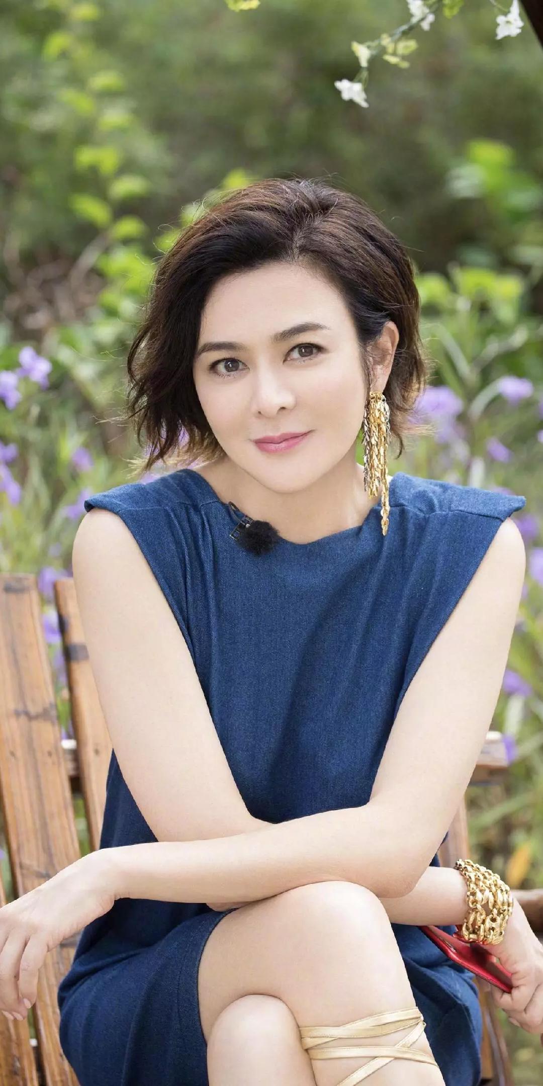 Rosamund Kwan, the champion of Miss Hong Kong in 1988, has a glimpse of ...