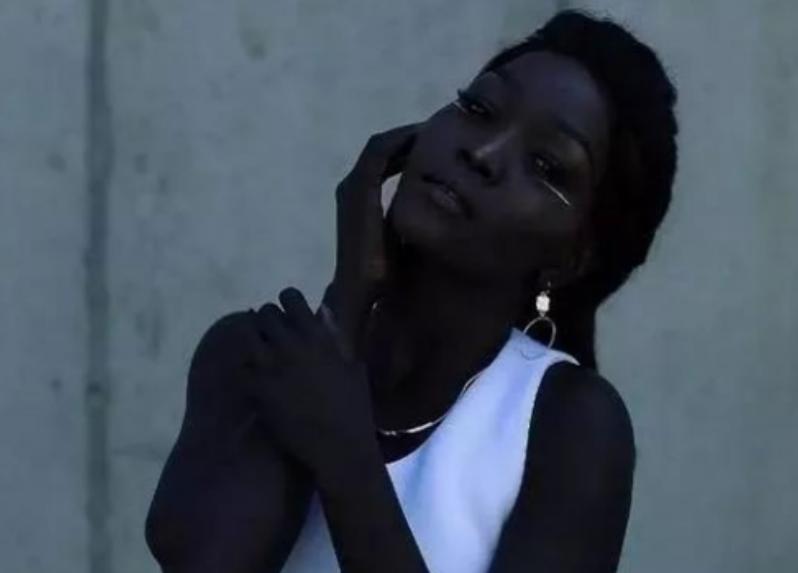 The world's blackest model, even the gums and lips are black, but the ...