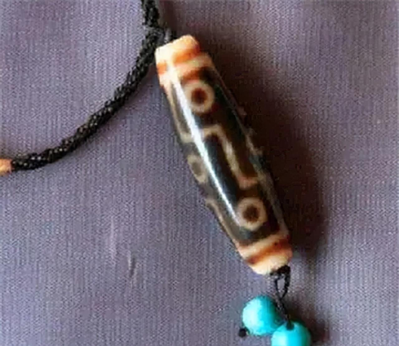 There are only 2 Nine-Eyed Dzi Beads left in the world. Jet Li bought ...