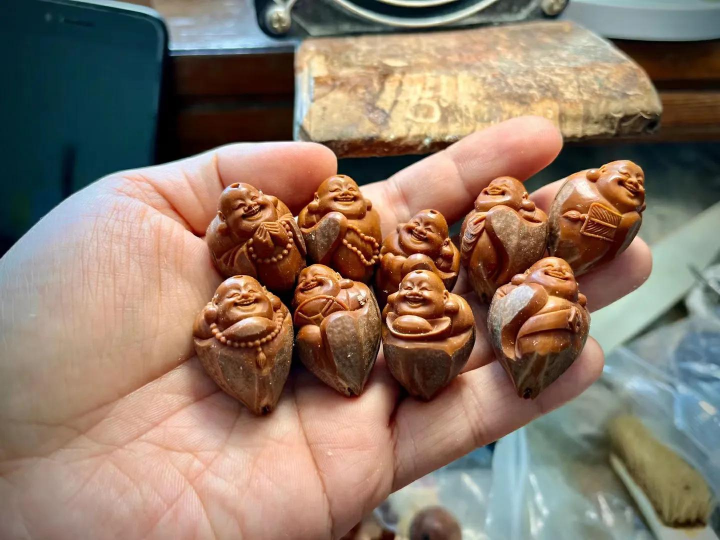 Value definition of olive stone carving - iMedia