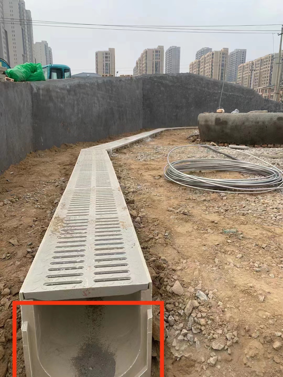 What are the materials of the finished drainage ditch and what are the ...