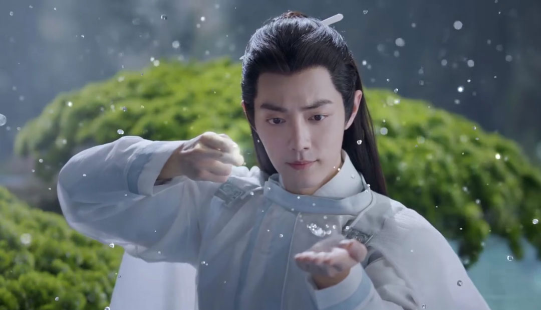 It's obviously the same person, after performing "Two Cities of Mirrors ...