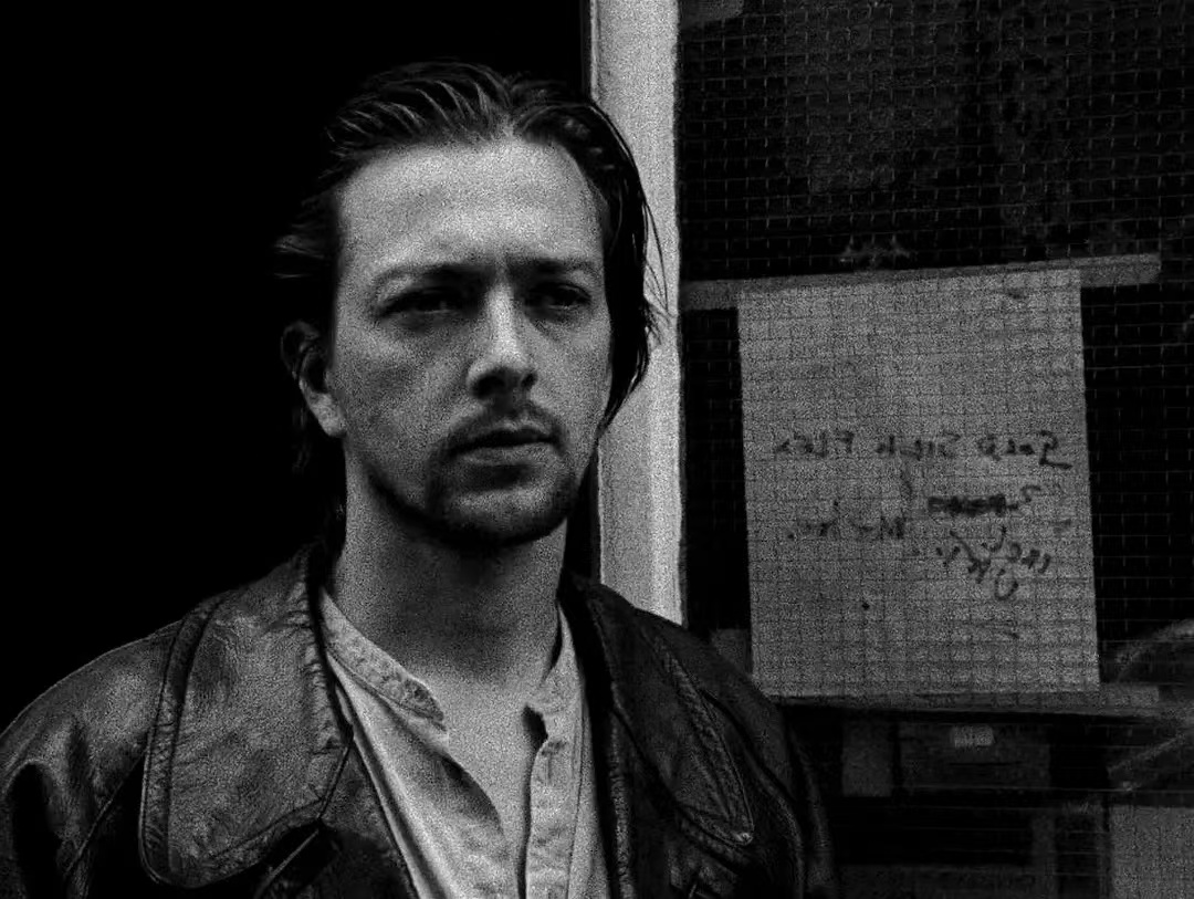 What are the characteristics of Nolan's first feature-length "Following ...