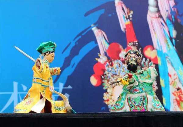 The one-meter-square puppet stage is filled with shared memories across ...