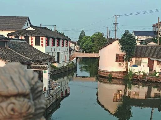 Qingpu: Jinze, a peaceful water town in time - iNEWS