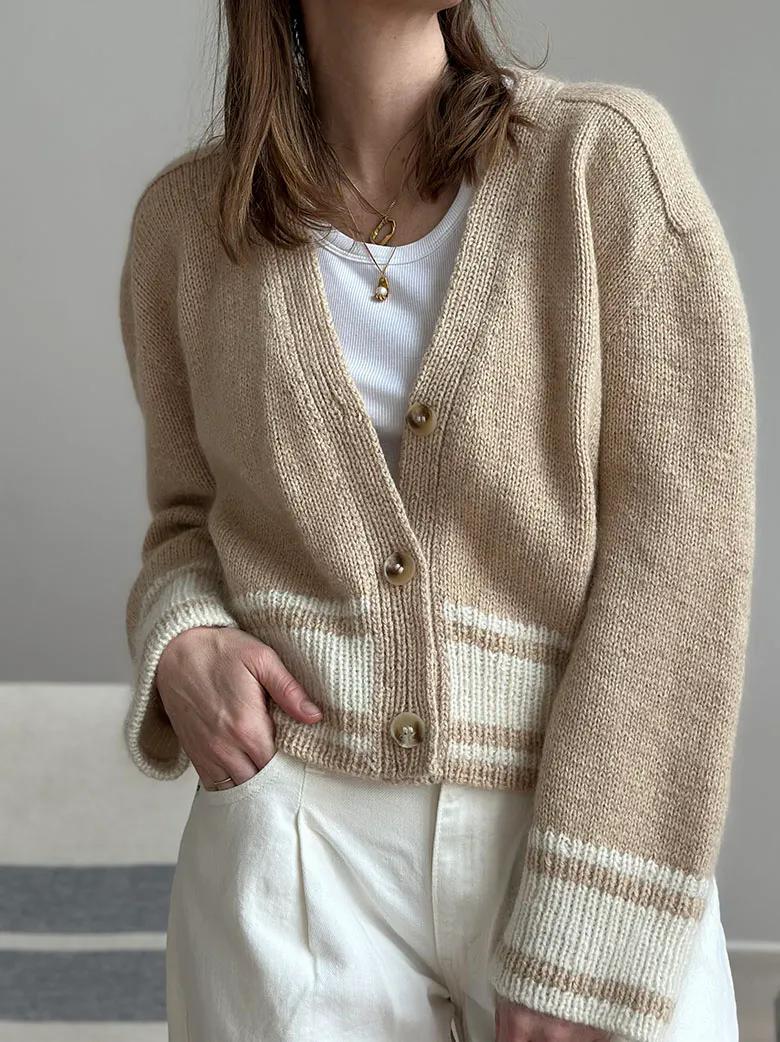 Simple is best! This saddle shoulder cardigan is knitted from top to ...